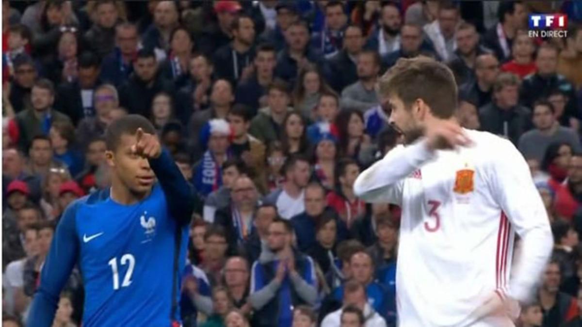 Gerard Pique and Kylian Mbappe swap shirts as Spain beat France